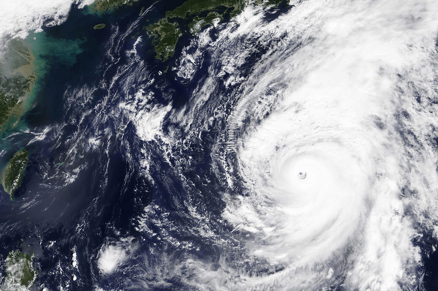 How can models adapt to Japan's typhoon risk?